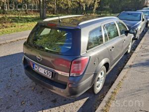 Grey Opel Astra 2012 in Riga, with an engine capacity of 1.70 L and mileage of 238 thousand km for 1930 €, photo 3 on AUTOMOTO.COM.LV