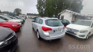 Grey Opel Astra 2012 in Riga, with an engine capacity of 1.40 L and mileage of 220 thousand km for 4000 €, photo 7 on AUTOMOTO.COM.LV