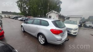 Grey Opel Astra 2012 in Riga, with an engine capacity of 1.40 L and mileage of 220 thousand km for 4000 €, photo 12 on AUTOMOTO.COM.LV