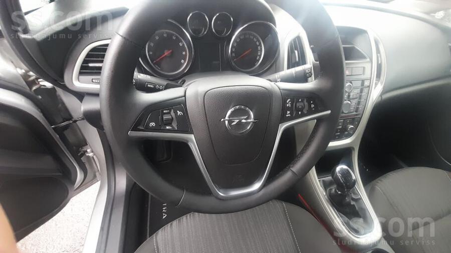 Grey Opel Astra 2012 in Riga, with an engine capacity of 1.40 L and mileage of 220 thousand km for 4000 €, photo 17 on AUTOMOTO.COM.LV