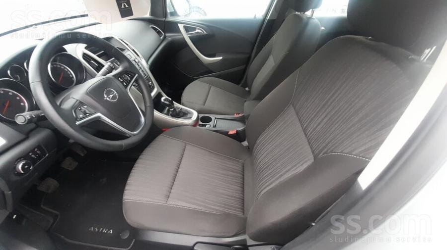 Grey Opel Astra 2012 in Riga, with an engine capacity of 1.40 L and mileage of 220 thousand km for 4000 €, photo 26 on AUTOMOTO.COM.LV
