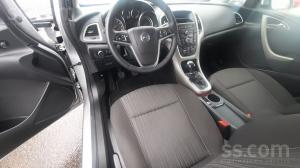 Grey Opel Astra 2012 in Riga, with an engine capacity of 1.40 L and mileage of 220 thousand km for 4000 €, photo 28 on AUTOMOTO.COM.LV