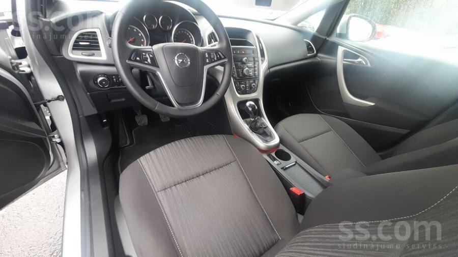 Grey Opel Astra 2012 in Riga, with an engine capacity of 1.40 L and mileage of 220 thousand km for 4000 €, photo 29 on AUTOMOTO.COM.LV