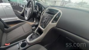 Grey Opel Astra 2012 in Riga, with an engine capacity of 1.40 L and mileage of 220 thousand km for 4000 €, photo 31 on AUTOMOTO.COM.LV
