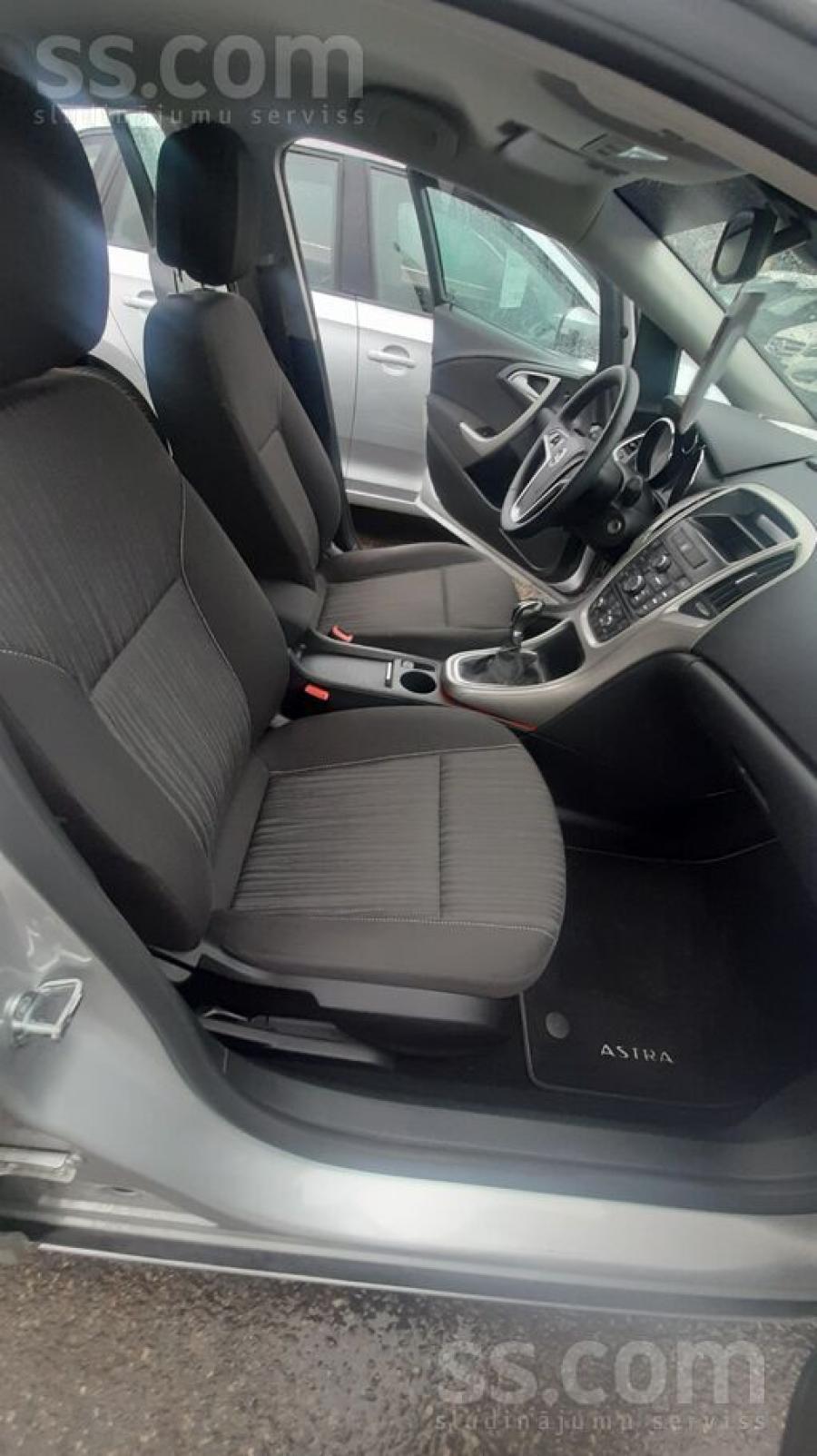 Grey Opel Astra 2012 in Riga, with an engine capacity of 1.40 L and mileage of 220 thousand km for 4000 €, photo 32 on AUTOMOTO.COM.LV