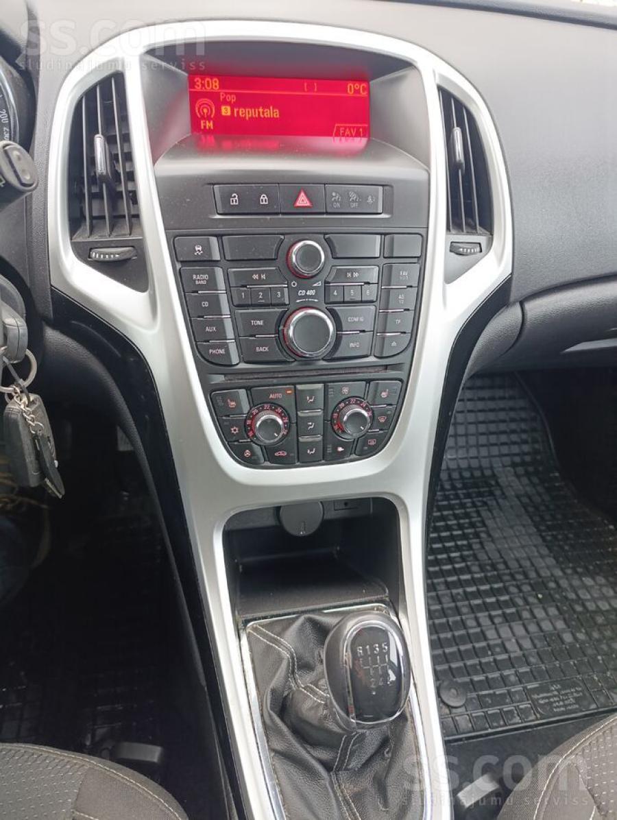 Grey Opel Astra 2012 in Riga, with an engine capacity of 1.40 L and mileage of 293 thousand km for 3450 €, photo 7 on AUTOMOTO.COM.LV