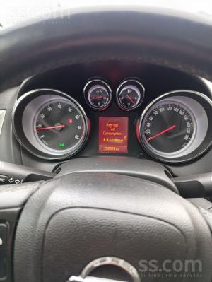 Grey Opel Astra 2012 in Riga, with an engine capacity of 1.40 L and mileage of 293 thousand km for 3450 €, photo 8 on AUTOMOTO.COM.LV