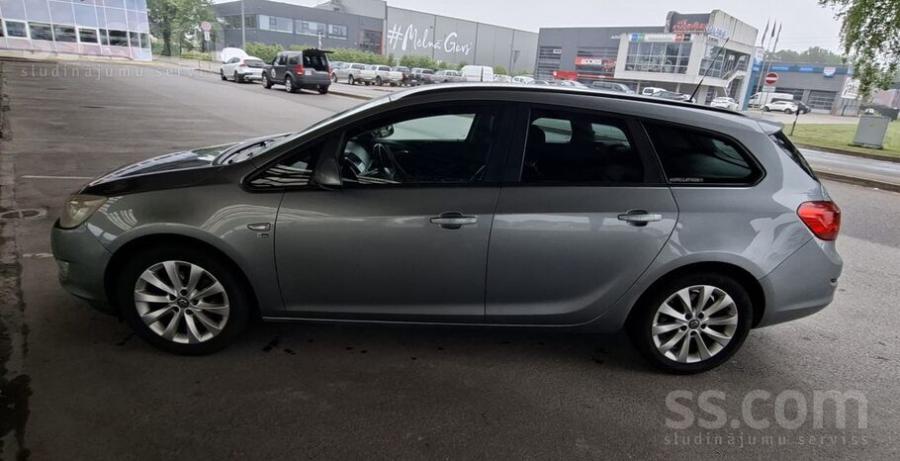 Grey Opel Astra 2012 in Riga, with an engine capacity of 1.70 L and mileage of 280 thousand km for 2500 €, photo 9 on AUTOMOTO.COM.LV