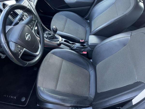 Grey Opel Astra 2012 in Ukmerge, with an engine capacity of 1.69 L and mileage of 251 thousand km for 2350 €, photo 10 on AUTOMOTO.COM.LV