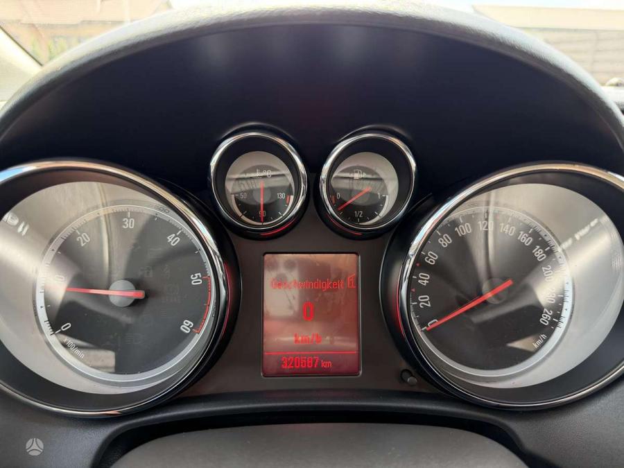 Grey Opel Astra 2012 in Klaipeda, with an engine capacity of 1.96 L and mileage of 320 thousand km for 2750 €, photo 18 on AUTOMOTO.COM.LV