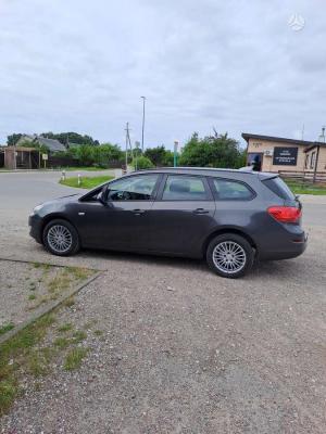 Grey Opel Astra 2012 in Klaipeda, with an engine capacity of 1.70 L and mileage of 180 thousand km for 2900 €, photo  on AUTOMOTO.COM.LV
