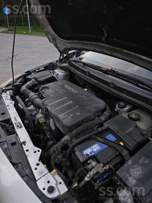 Grey Opel Astra 2012 in Riga, with an engine capacity of 1.70 L and mileage of 468 thousand km for 2700 €, photo 12 on AUTOMOTO.COM.LV