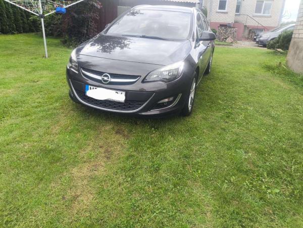Grey Opel Astra 2013 in Taurage, with an engine capacity of 1.69 L and mileage of 233 thousand km for 4200 €, photo 6 on AUTOMOTO.COM.LV