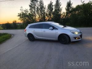 Grey Opel Astra 2013 in Tukums, with an engine capacity of 1.70 L and mileage of 255 thousand km for 4250 €, photo 14 on AUTOMOTO.COM.LV