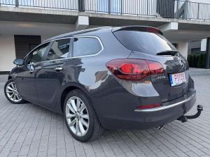 Grey Opel Astra 2013 in Vilnius, with an engine capacity of 2.00 L and mileage of 311 thousand km for 3750 €, photo 7 on AUTOMOTO.COM.LV