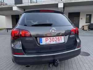 Grey Opel Astra 2013 in Vilnius, with an engine capacity of 2.00 L and mileage of 311 thousand km for 3750 €, photo 8 on AUTOMOTO.COM.LV
