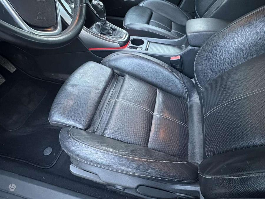 Grey Opel Astra 2013 in Vilnius, with an engine capacity of 2.00 L and mileage of 311 thousand km for 3750 €, photo 14 on AUTOMOTO.COM.LV