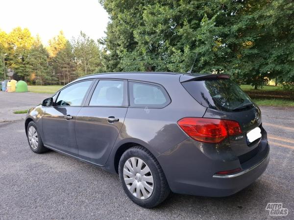 Grey Opel Astra 2013 in Mazeikiai, with an engine capacity of 1.20 L and mileage of 324 thousand km for 3229 €, photo 2 on AUTOMOTO.COM.LV