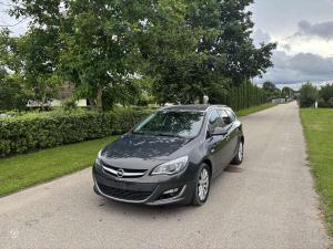 Grey Opel Astra 2013 in Jurbarkas, with an engine capacity of 1.96 L and mileage of 198 thousand km for 4500 €, photo  on AUTOMOTO.COM.LV