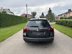 Grey Opel Astra 2013 in Jurbarkas, with an engine capacity of 1.96 L and mileage of 198 thousand km for 4500 €, photo 7 on AUTOMOTO.COM.LV