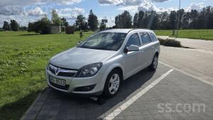 Grey Opel Astra 2013 in Riga, with an engine capacity of 1.70 L and mileage of 300 thousand km for 1590 €, photo  on AUTOMOTO.COM.LV