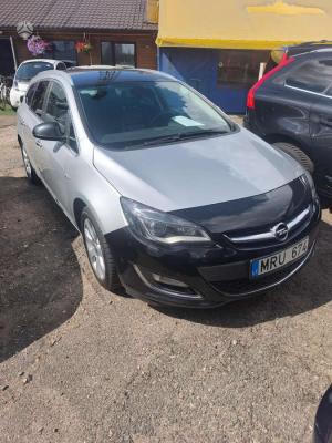 Grey Opel Astra 2013 in Kaunas, with an engine capacity of 1.96 L and mileage of 220 thousand km for 2600 €, photo 3 on AUTOMOTO.COM.LV