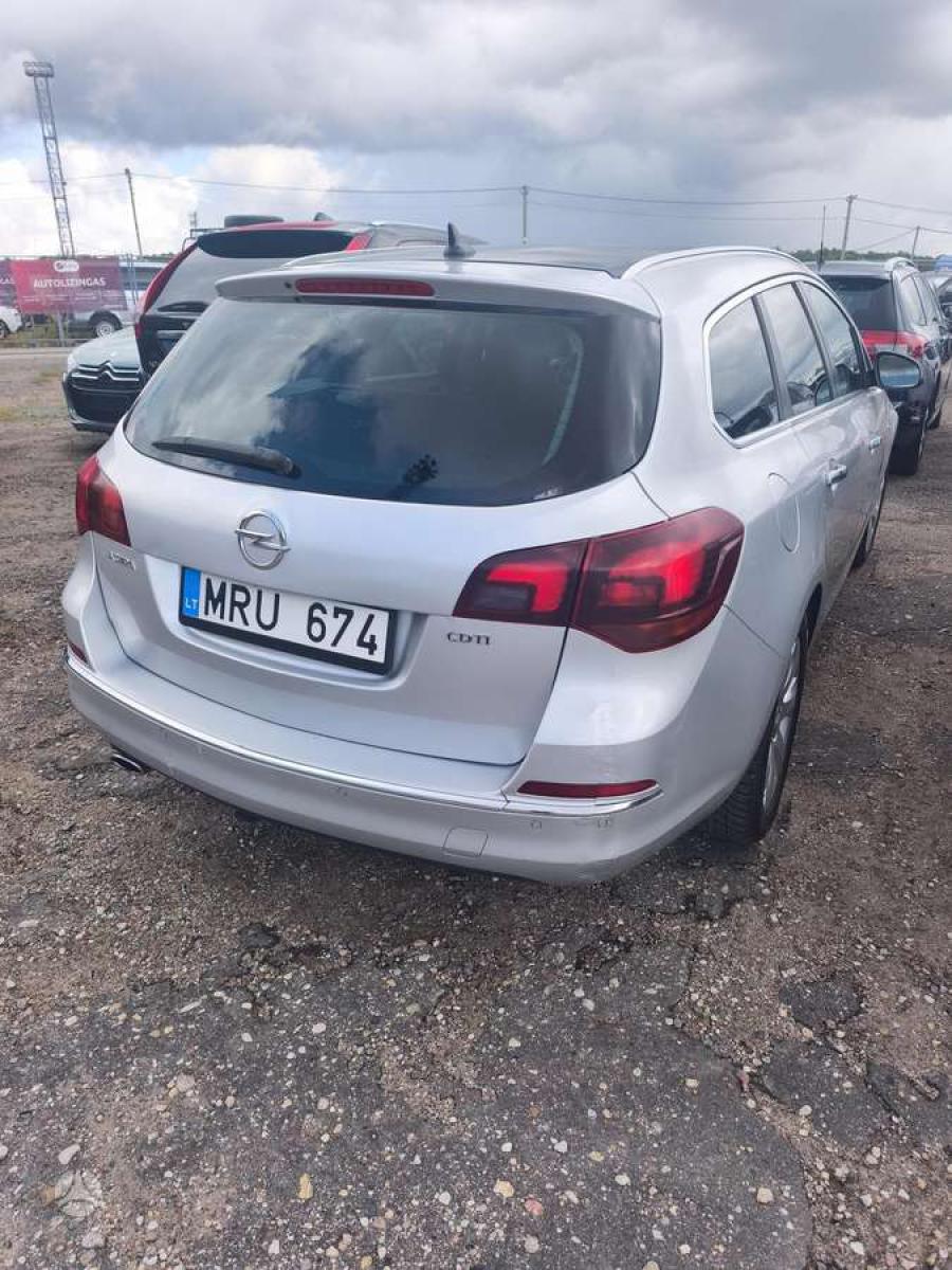Grey Opel Astra 2013 in Kaunas, with an engine capacity of 1.96 L and mileage of 220 thousand km for 2600 €, photo 11 on AUTOMOTO.COM.LV