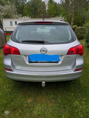 Grey Opel Astra 2013 in Kaunas, with an engine capacity of 1.69 L and mileage of 261 thousand km for 2150 €, photo 6 on AUTOMOTO.COM.LV