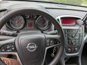 Grey Opel Astra 2013 in Kaunas, with an engine capacity of 1.69 L and mileage of 261 thousand km for 2150 €, photo 12 on AUTOMOTO.COM.LV