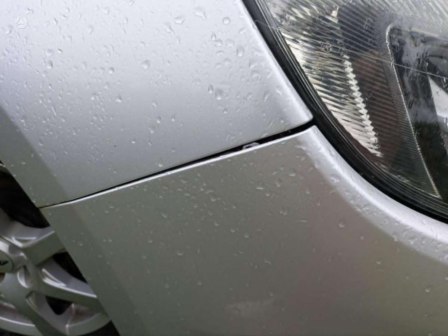 Grey Opel Astra 2013 in Kaunas, with an engine capacity of 1.69 L and mileage of 261 thousand km for 2150 €, photo 20 on AUTOMOTO.COM.LV