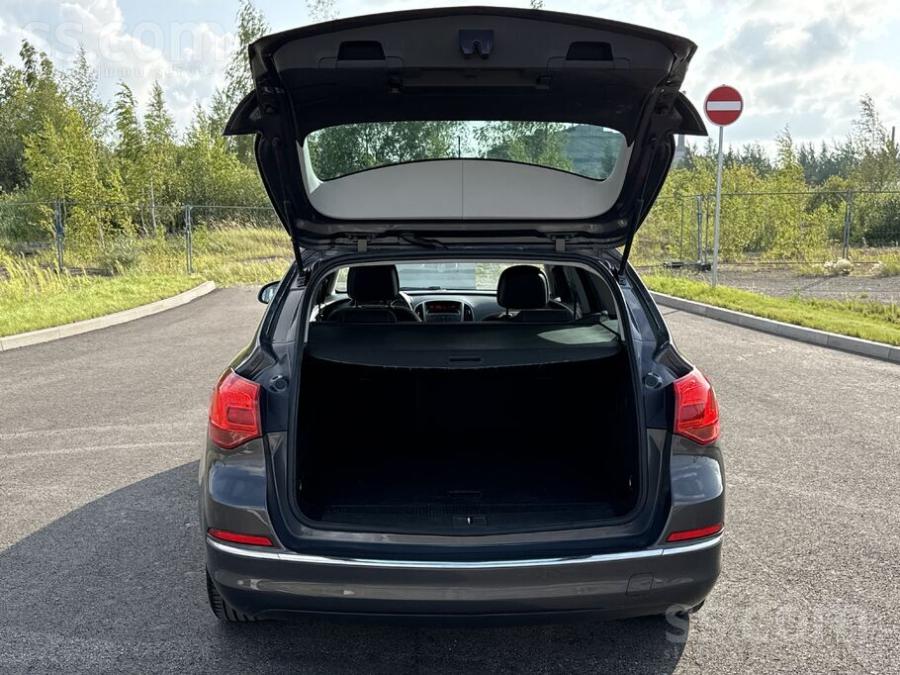 Grey Opel Astra 2013 in Liepaja, with an engine capacity of 1.40 L and mileage of 207 thousand km for 5200 €, photo 11 on AUTOMOTO.COM.LV