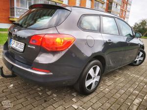 Grey Opel Astra 2013 in Klaipeda, with an engine capacity of 1.70 L and mileage of 171 thousand km for 3390 €, photo 7 on AUTOMOTO.COM.LV