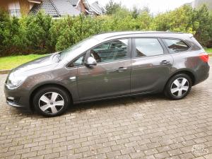 Grey Opel Astra 2013 in Klaipeda, with an engine capacity of 1.70 L and mileage of 171 thousand km for 3390 €, photo 8 on AUTOMOTO.COM.LV