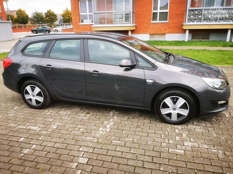 Grey Opel Astra 2013 in Klaipeda, with an engine capacity of 1.70 L and mileage of 171 thousand km for 3390 €, photo 9 on AUTOMOTO.COM.LV