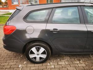 Grey Opel Astra 2013 in Klaipeda, with an engine capacity of 1.70 L and mileage of 171 thousand km for 3390 €, photo 12 on AUTOMOTO.COM.LV
