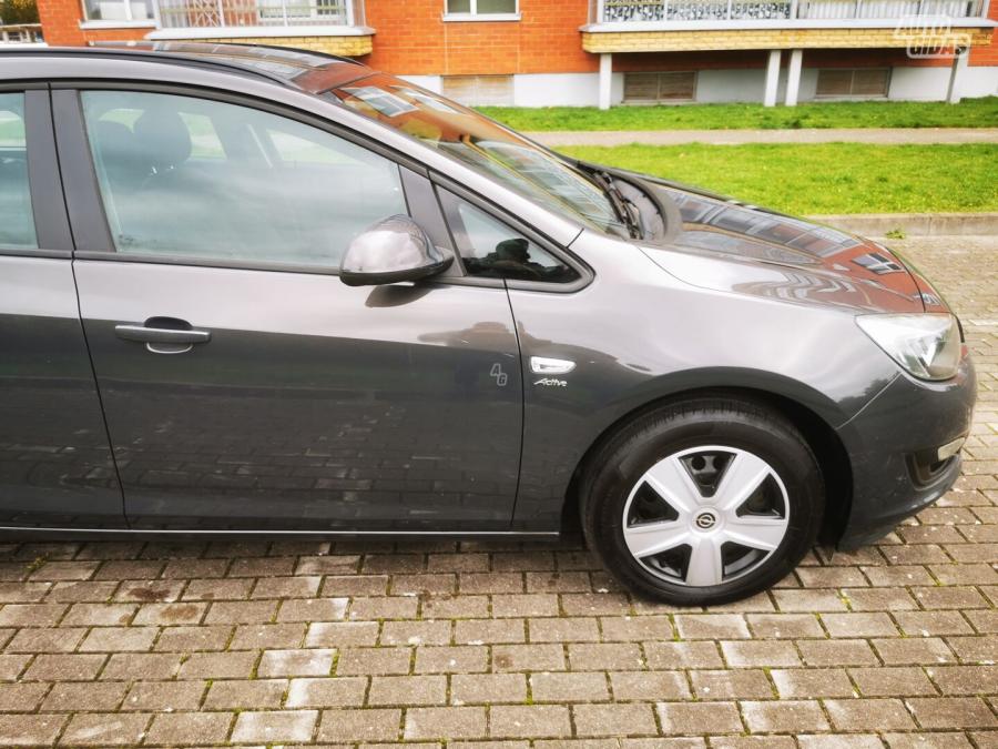 Grey Opel Astra 2013 in Klaipeda, with an engine capacity of 1.70 L and mileage of 171 thousand km for 3390 €, photo 13 on AUTOMOTO.COM.LV