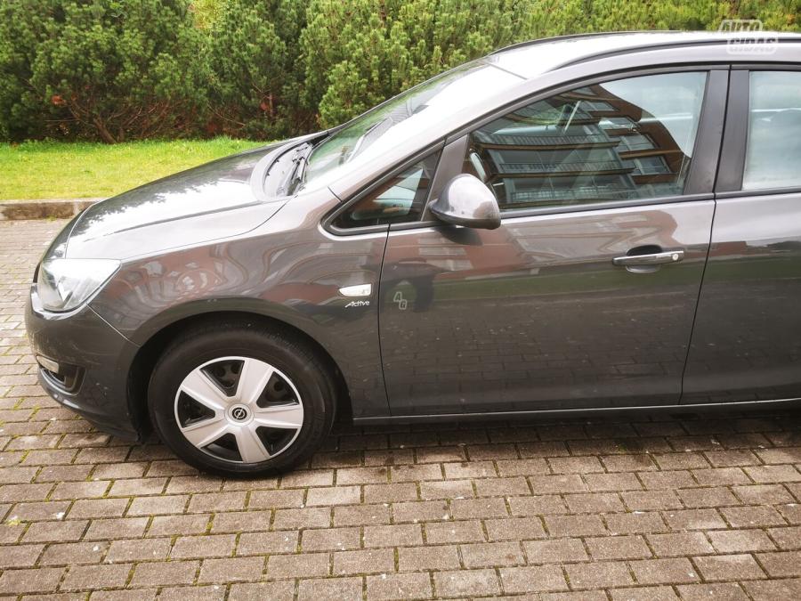 Grey Opel Astra 2013 in Klaipeda, with an engine capacity of 1.70 L and mileage of 171 thousand km for 3390 €, photo 14 on AUTOMOTO.COM.LV