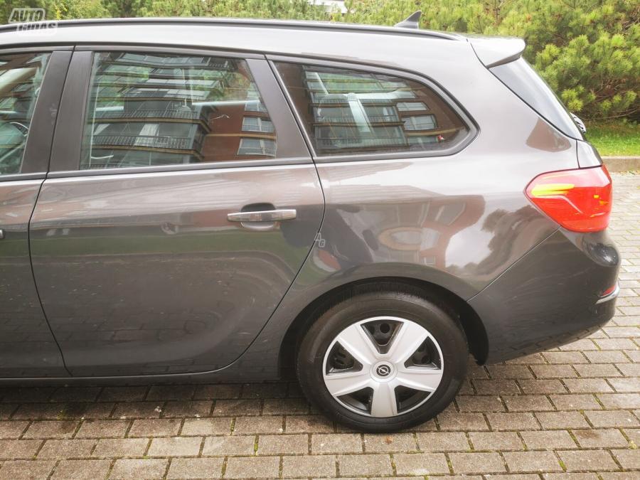 Grey Opel Astra 2013 in Klaipeda, with an engine capacity of 1.70 L and mileage of 171 thousand km for 3390 €, photo 15 on AUTOMOTO.COM.LV