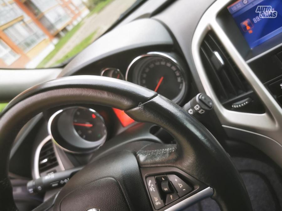 Grey Opel Astra 2013 in Klaipeda, with an engine capacity of 1.70 L and mileage of 171 thousand km for 3390 €, photo 25 on AUTOMOTO.COM.LV