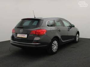 Grey Opel Astra 2014 in Vilnius, with an engine capacity of 1.60 L and mileage of 114 thousand km for 5899 €, photo 9 on AUTOMOTO.COM.LV