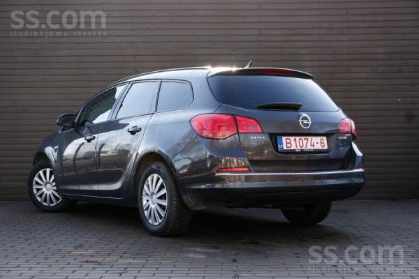 Grey Opel Astra 2014 in Riga, with an engine capacity of 2.00 L and mileage of 324 thousand km for 4490 €, photo 4 on AUTOMOTO.COM.LV