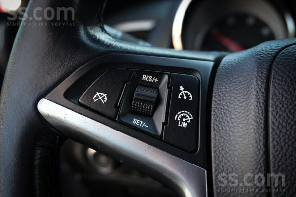 Grey Opel Astra 2014 in Riga, with an engine capacity of 2.00 L and mileage of 324 thousand km for 4490 €, photo 7 on AUTOMOTO.COM.LV