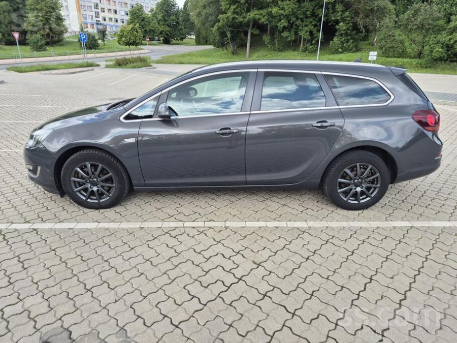 Grey Opel Astra 2014 in Saldus, with an engine capacity of 2.00 L and mileage of 260 thousand km for 4990 €, photo 3 on AUTOMOTO.COM.LV