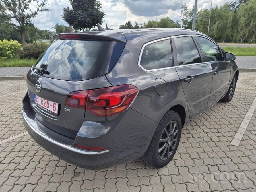 Grey Opel Astra 2014 in Saldus, with an engine capacity of 2.00 L and mileage of 260 thousand km for 4990 €, photo 6 on AUTOMOTO.COM.LV