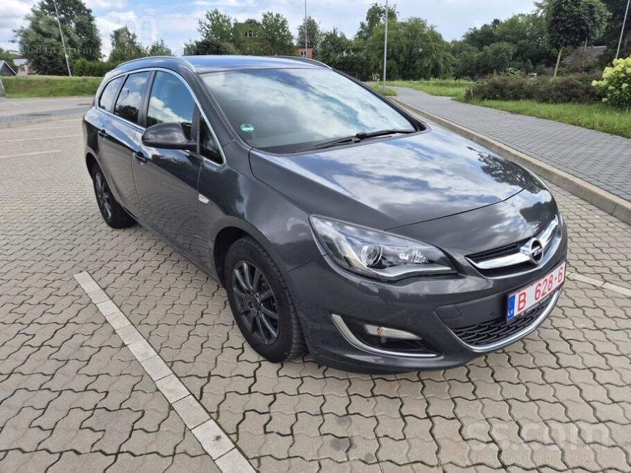 Grey Opel Astra 2014 in Saldus, with an engine capacity of 2.00 L and mileage of 260 thousand km for 4990 €, photo 8 on AUTOMOTO.COM.LV