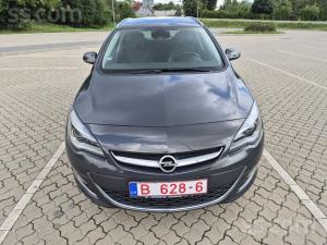 Grey Opel Astra 2014 in Saldus, with an engine capacity of 2.00 L and mileage of 260 thousand km for 4990 €, photo 9 on AUTOMOTO.COM.LV
