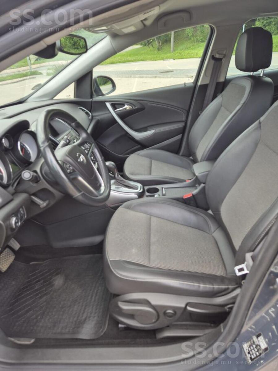 Grey Opel Astra 2014 in Saldus, with an engine capacity of 2.00 L and mileage of 260 thousand km for 4990 €, photo 12 on AUTOMOTO.COM.LV