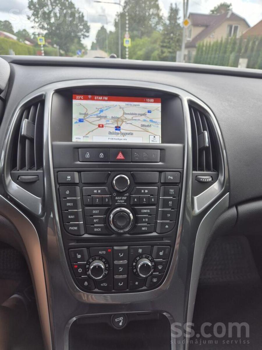 Grey Opel Astra 2014 in Saldus, with an engine capacity of 2.00 L and mileage of 260 thousand km for 4990 €, photo 14 on AUTOMOTO.COM.LV