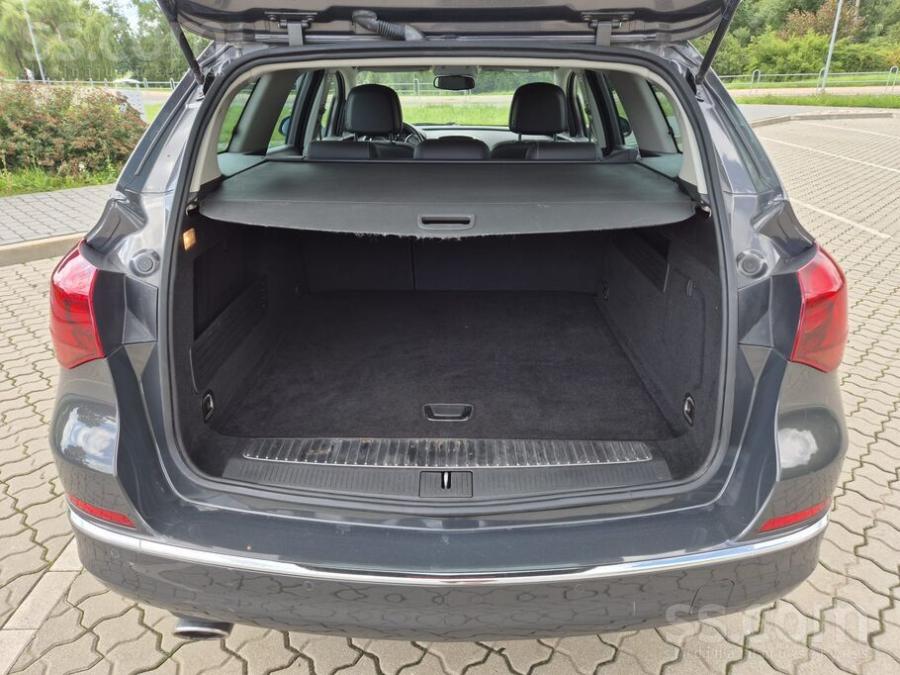 Grey Opel Astra 2014 in Saldus, with an engine capacity of 2.00 L and mileage of 260 thousand km for 4990 €, photo 15 on AUTOMOTO.COM.LV