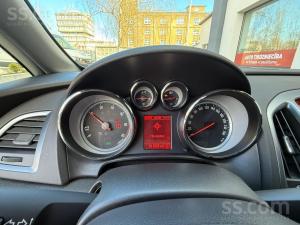 Grey Opel Astra 2014 in Riga, with an engine capacity of 1.60 L and mileage of 262 thousand km for 3600 €, photo 12 on AUTOMOTO.COM.LV